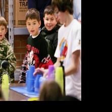 8th-grader wows Newell Elementary with cup-stacking skills