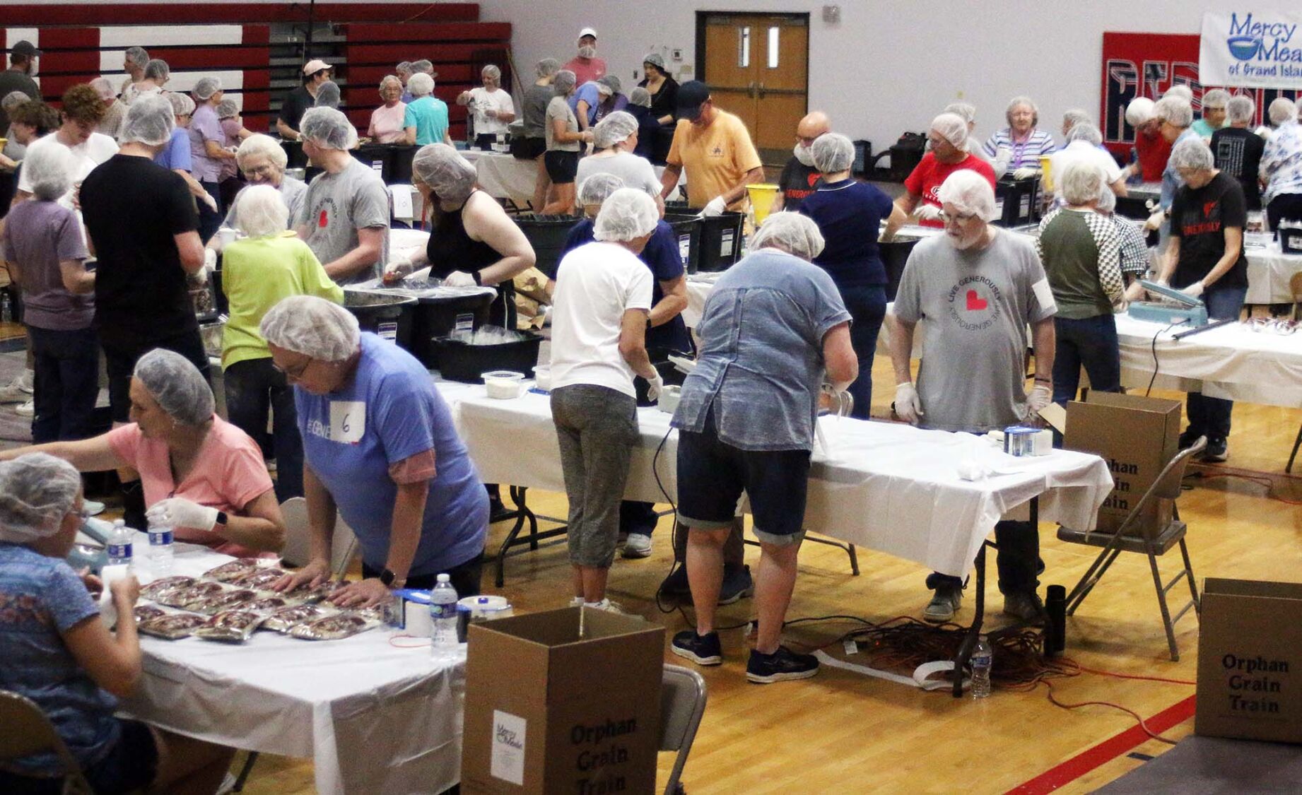 Photos: 300-plus volunteers package Mercy Meals in Grand Island