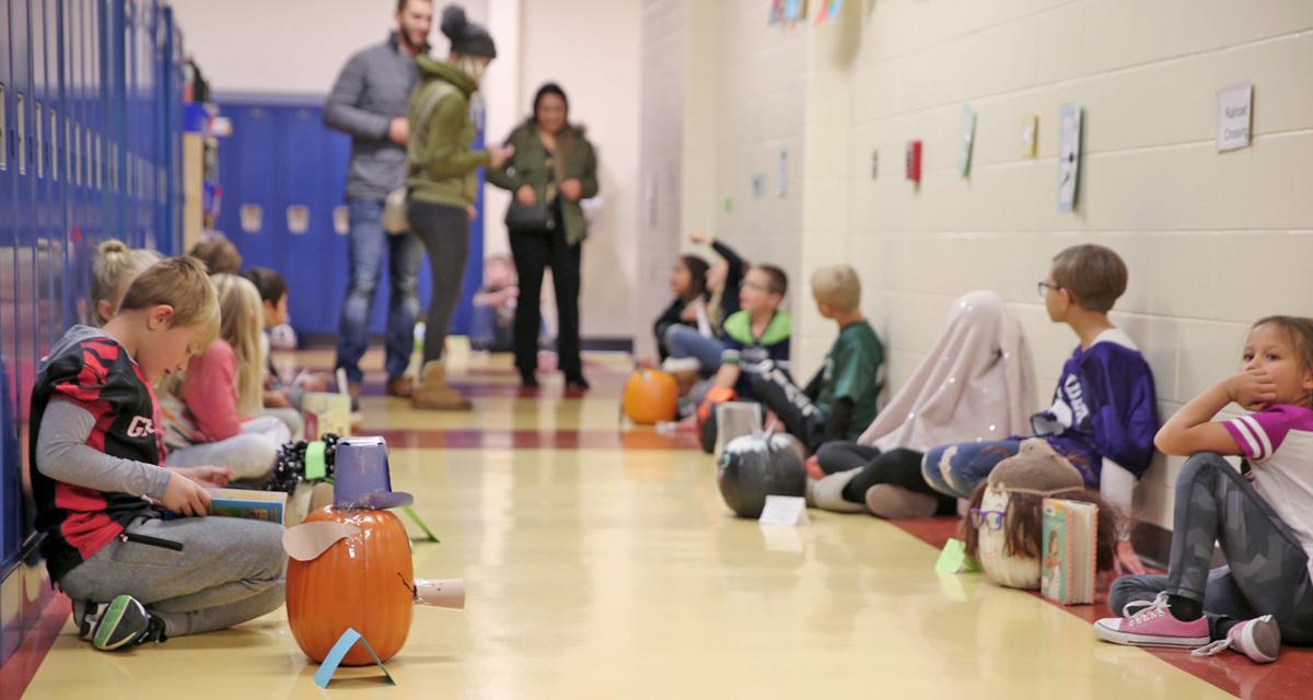 Shoemaker Elementary students pair pumpkins with their favorite books ...