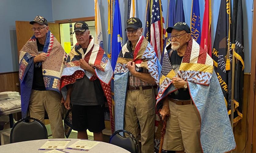 4 Schencks from St. Paul stand taller with Quilts of Valor