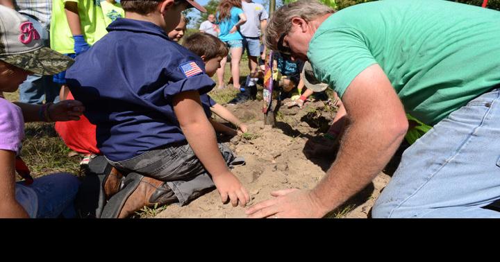 Planting for the future; Cub Scouts plant 14 new trees