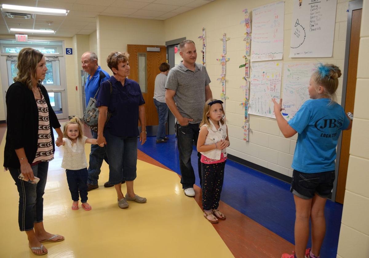 Shoemaker students help show off their expanded and renovated school ...