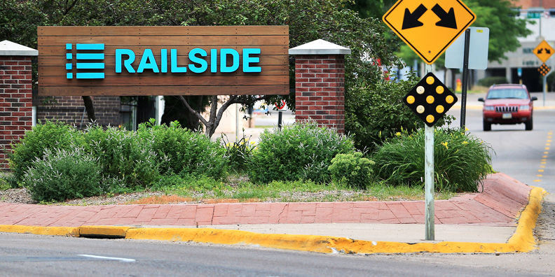 Railside signs in place, banners on the way