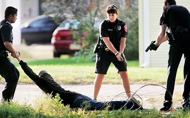 Two arrested for breaking into G.I. garage