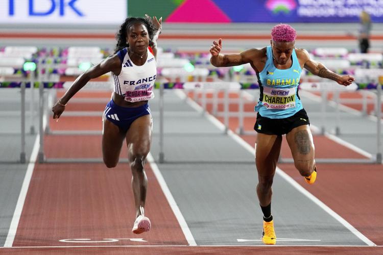 Charlton wins world title in world record! | Sports | thenassauguardian.com