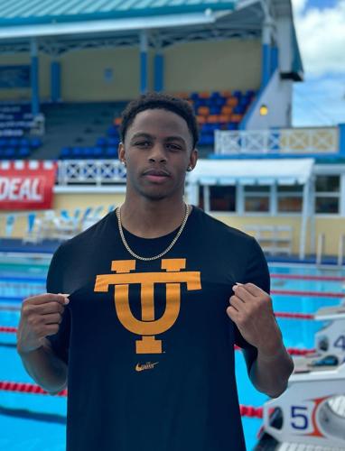 Swimmer Lamar Taylor makes successful debut for Tennessee Volunteers ...