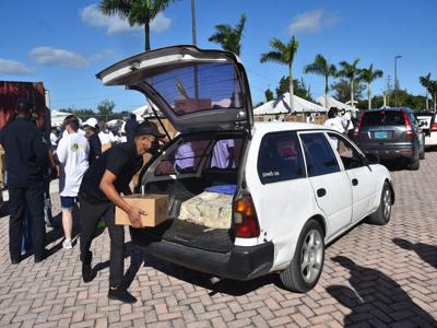 Massive turnout for Island Luck food giveaway | News ...