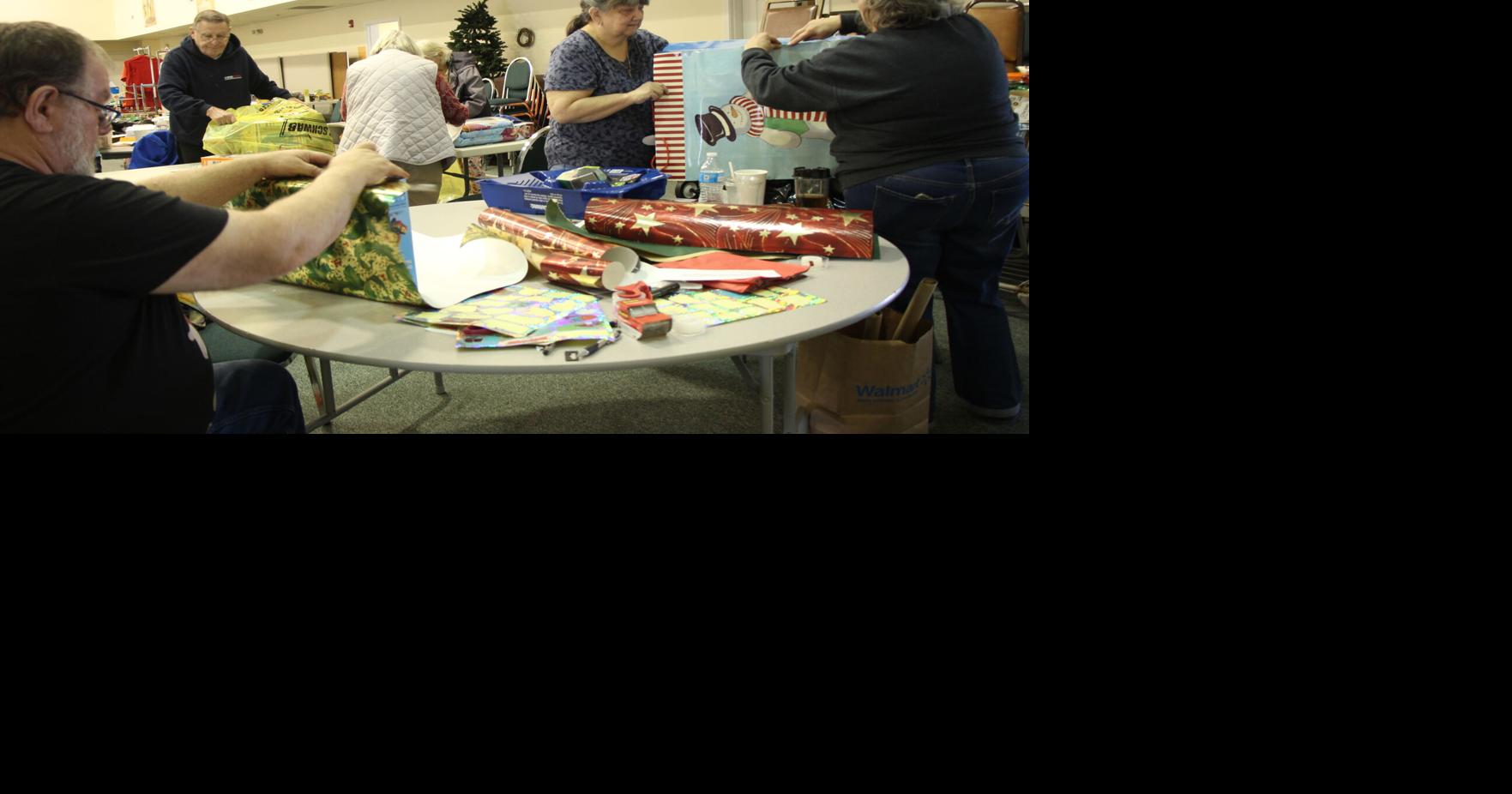 Photos / Christmas Spirit: Volunteers wrap toys, assemble Christmas ...
