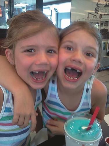 DORITY TWINS BONDED ON, OFF THE COURT | | theparisnews.com