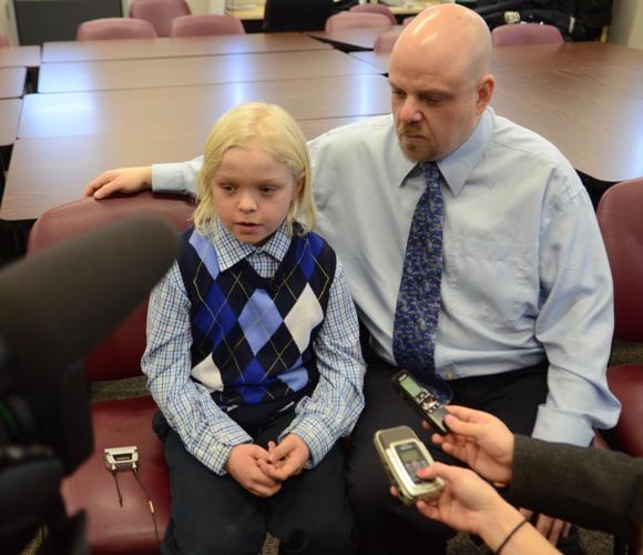 8-year-old recognized for saving his dad's life