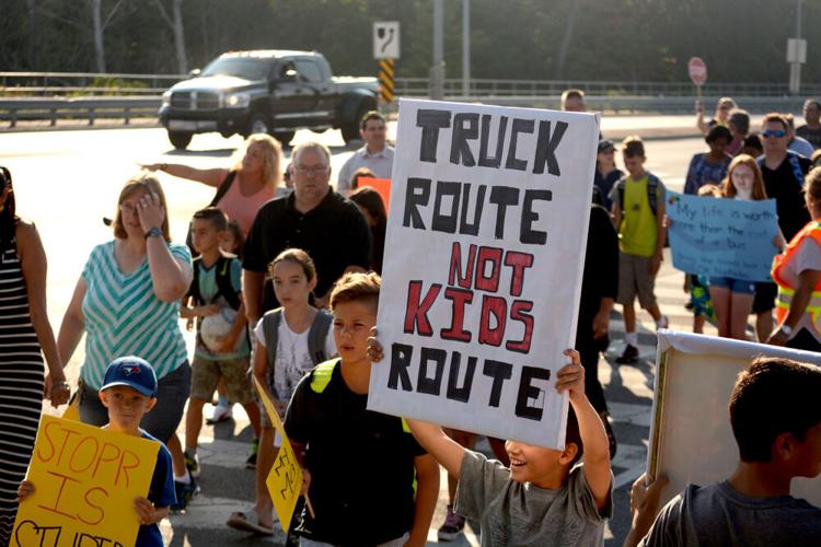 Frustrated families protest Bolton by-pass bus route cancellation