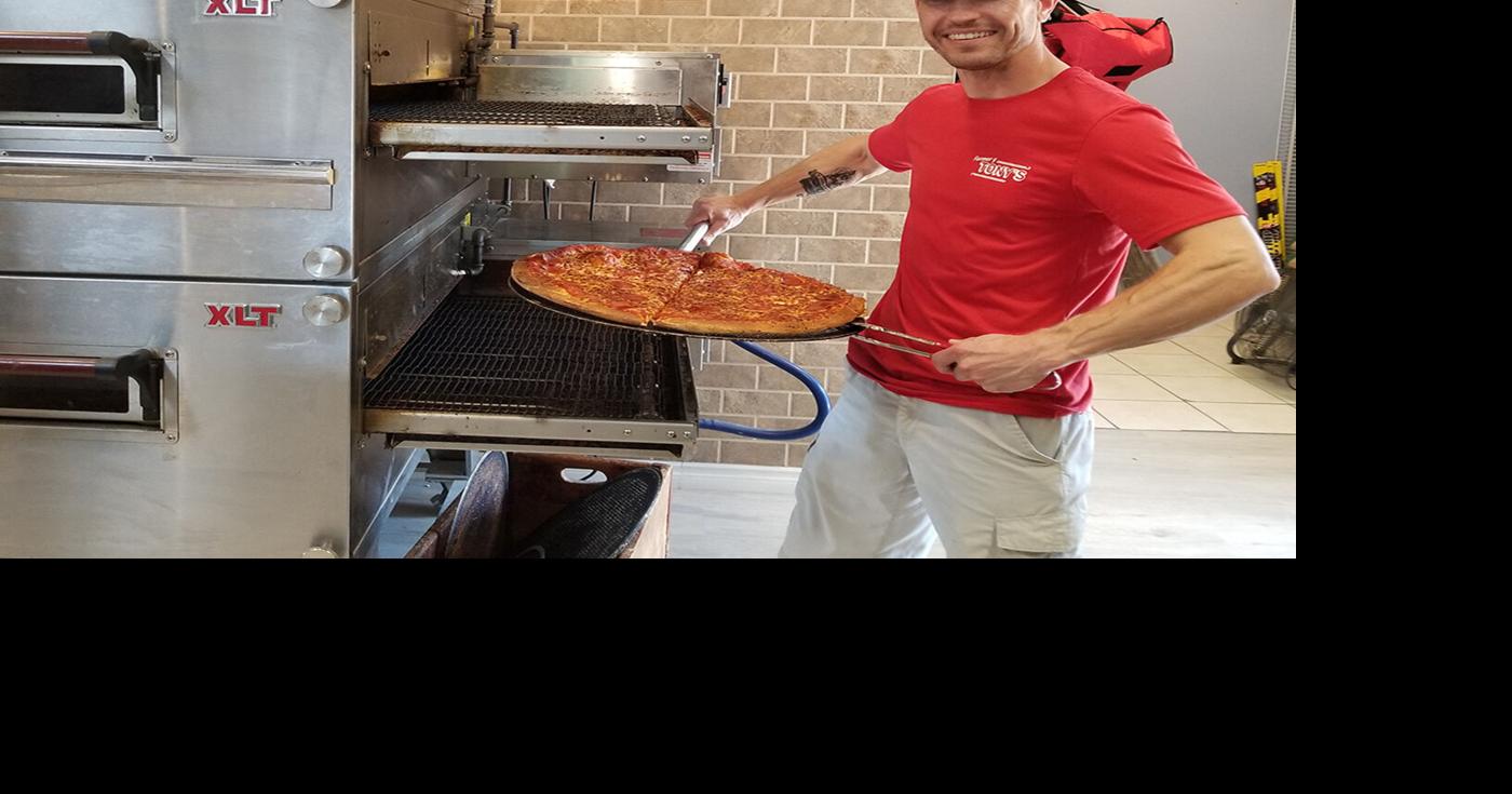 Pizza shop owner marks opening in Lindsay’s east end