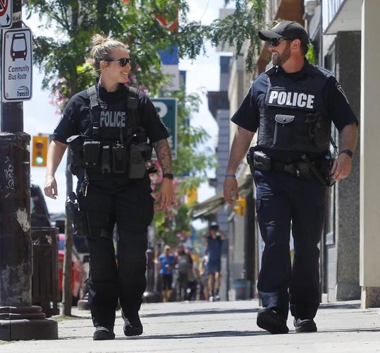 Photos: City police officers conducting foot patrols in downtown ...