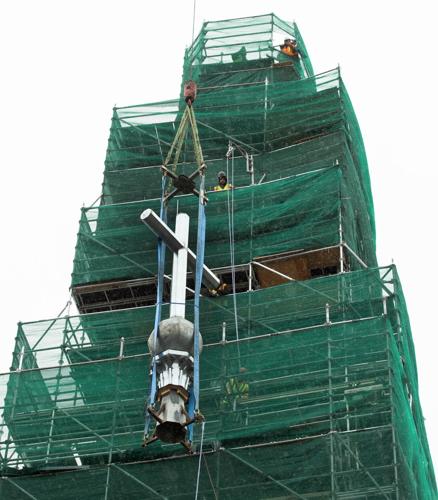 Iconic cross reinstalled at Peterborough Cathedral