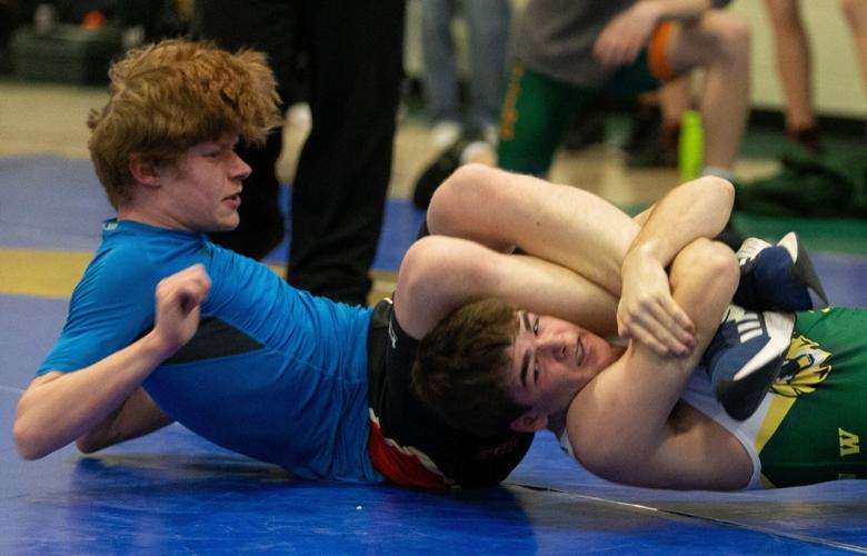 Pinning the competition at wrestling tournament