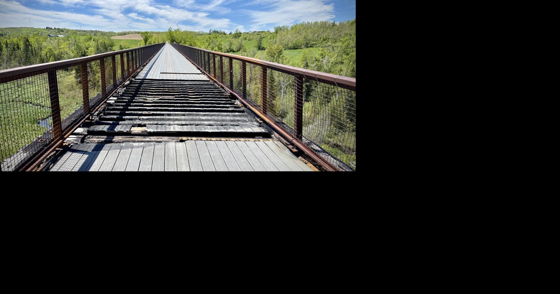 Officials sign contract to repair Doube’s trestle bridge