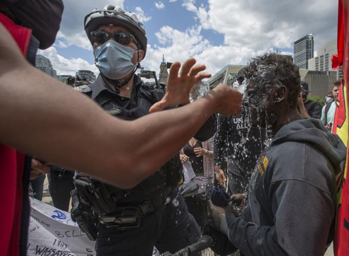 Man charged after showing up to Toronto anti-racism march in blackface