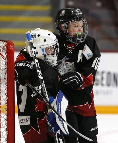 Campbellford Colts give coach a gift