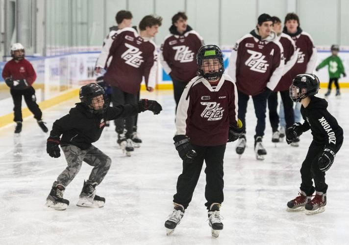 Hockey players and skaters help end hunger