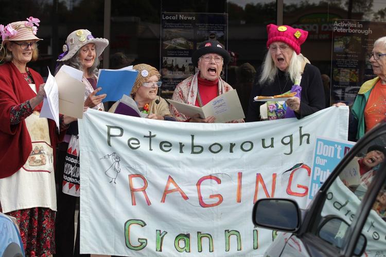 Raging Grannies sing their privatized health-care concerns to MPP’s office