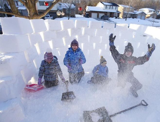 Photos: Siblings build giant snow fort in front of their Peterborough home