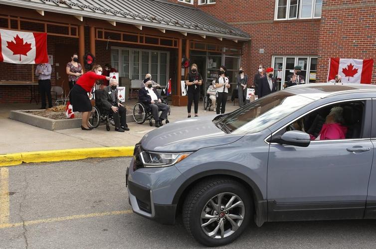 Photos: Drive-by Remembrance Day service at St. Joseph’s at Fleming ...