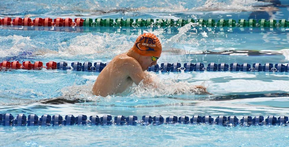 Local athletes swim home with 23 medals from recent meets