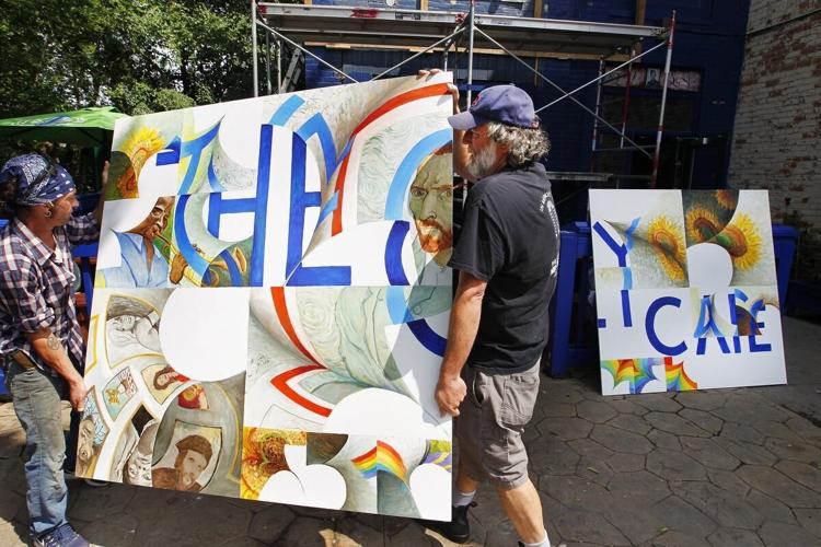 Photos: Local artist creates new signage for popular downtown ...