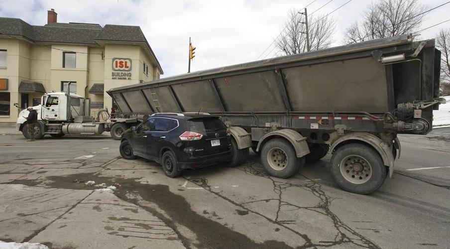 Photos: Truck-car collision blocks downtown Peterborough intersection