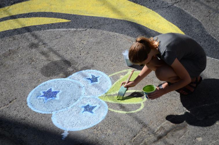 After fight at City Hall, artists get their first road mural at ...