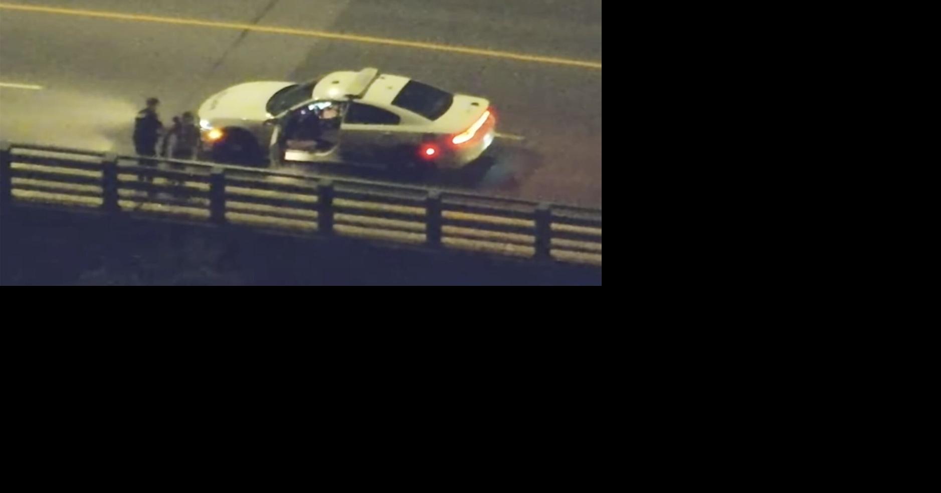 Police officer saves man from jumping off bridge