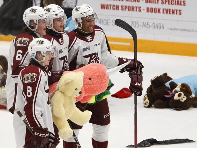 Photos: 1,070 teddy bears rain down at Peterborough Petes game