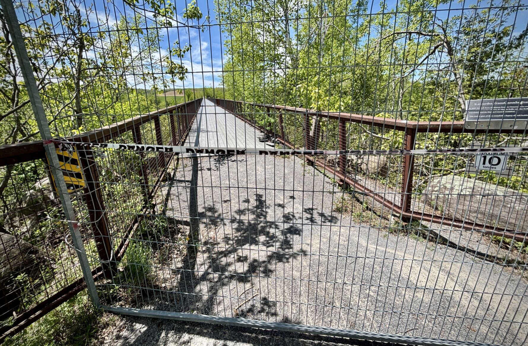 Officials sign contract to repair Doube’s trestle bridge