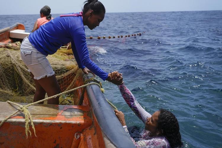 Venezuelan women are increasingly taking up the grueling work of ...