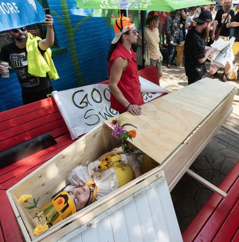 Pollinator Parade buzzes through downtown Peterborough