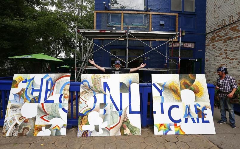 Photos: Local artist creates new signage for popular downtown ...