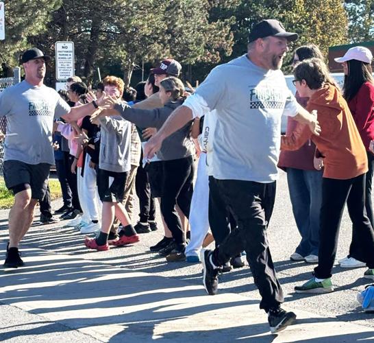 Holy Cross staff go the distance in 50 km Terry Fox relay