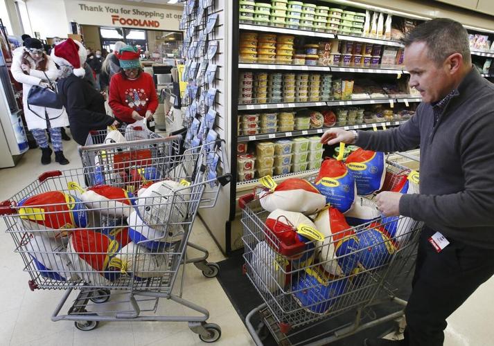 Photos: Lakefield Foodland spreads Christmas cheer with annual turkey ...