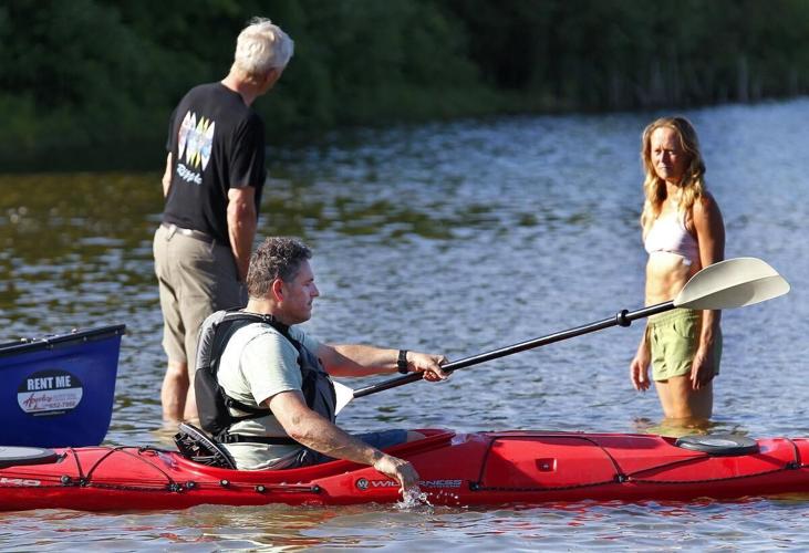 Photos: People take to waters in canoes, kayaks for Family Paddle Day ...