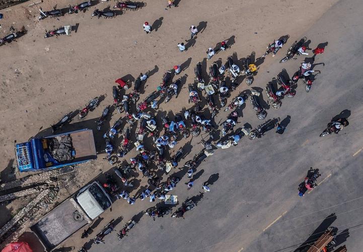 Motorcycle taxi drivers in Congo rally for Ebola awareness as attacks ...