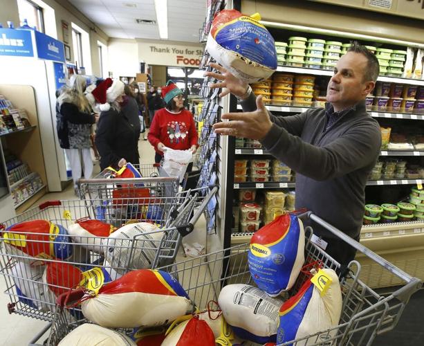 Photos: Lakefield Foodland spreads Christmas cheer with annual turkey ...