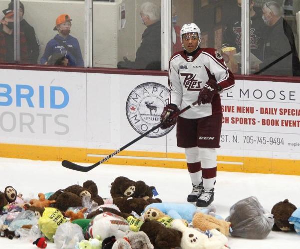 Photos: 1,070 teddy bears rain down at Peterborough Petes game