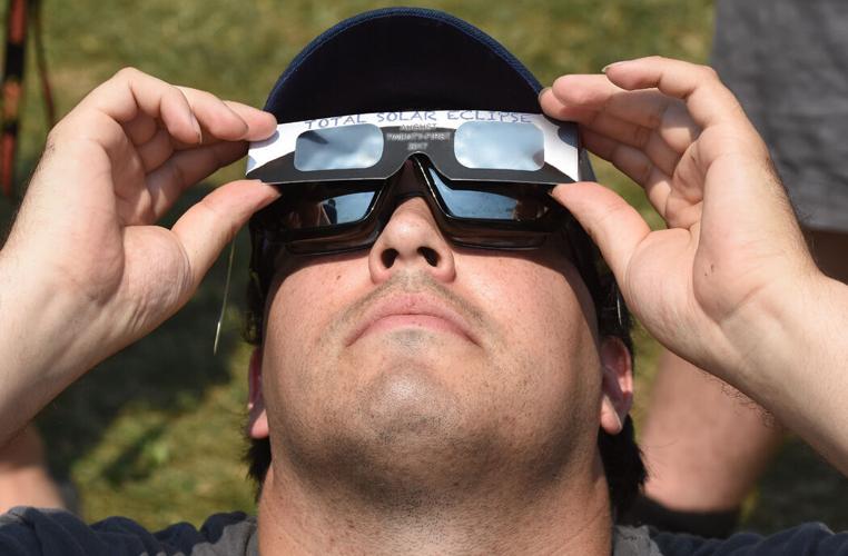 Photos: People gather atop Armour Hill to see solar eclipse