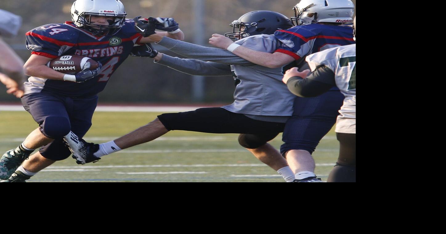 TAS Griffins junior football team win COSSA AAA title