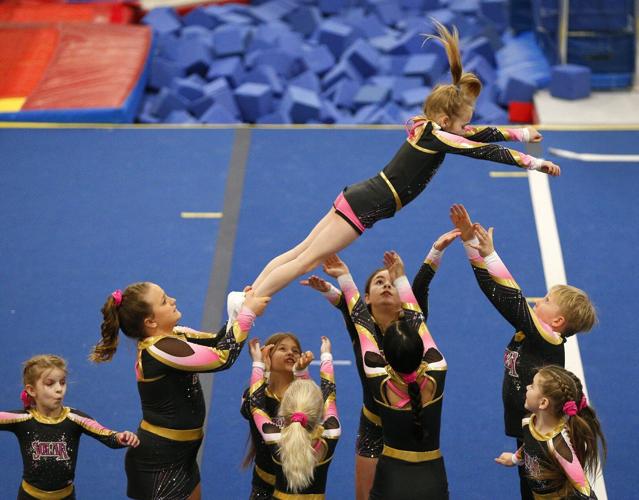 Two cheerleading squads qualify for competitions
