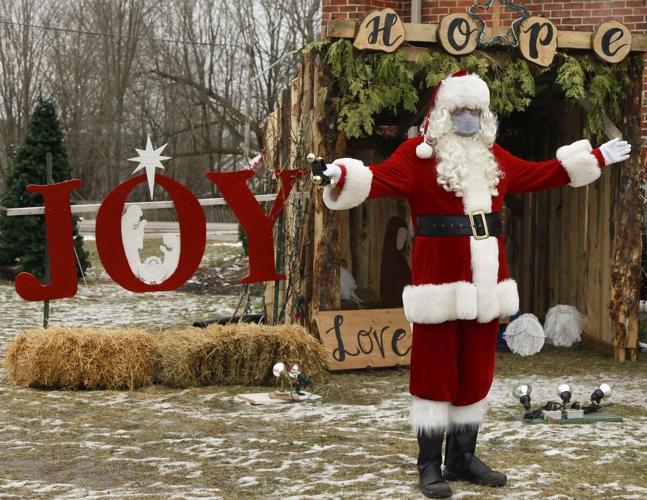 Photos: Santa offers hope with visit to the manger in Keene
