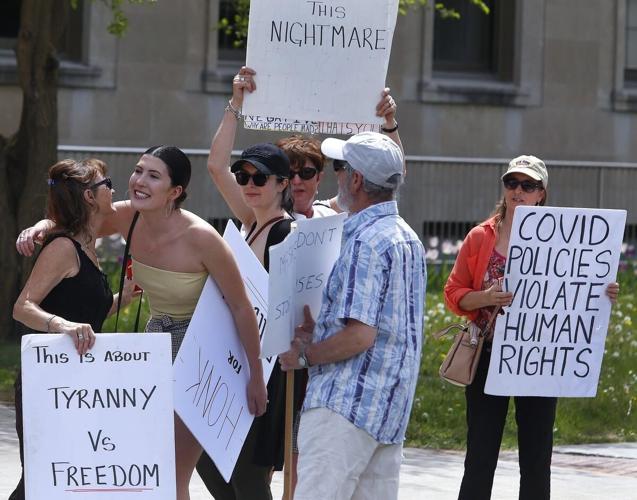 Photos: Police monitor protest outside Peterborough City Hall