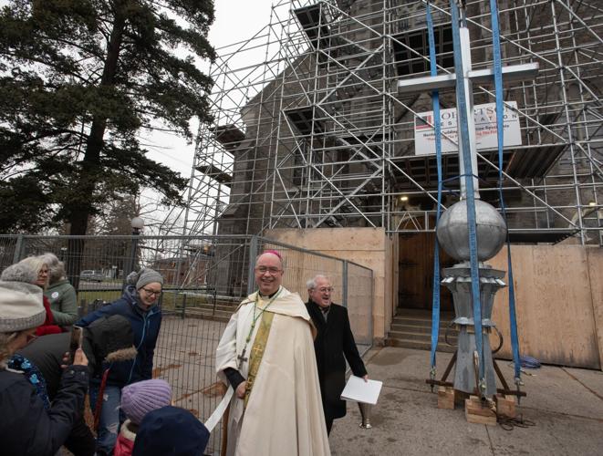 Iconic cross reinstalled at Peterborough Cathedral