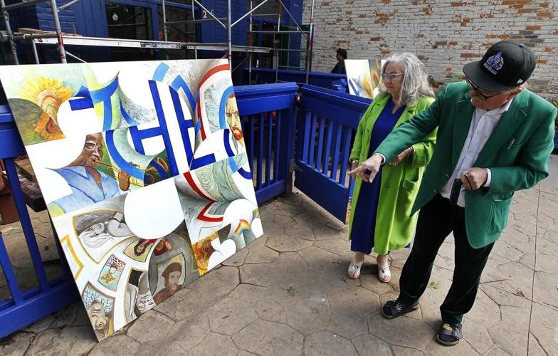Photos: Local artist creates new signage for popular downtown ...