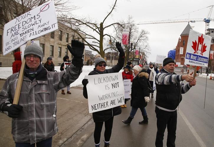 Photos: Anti-mask group protests lockdown outside Peterborough City Hall